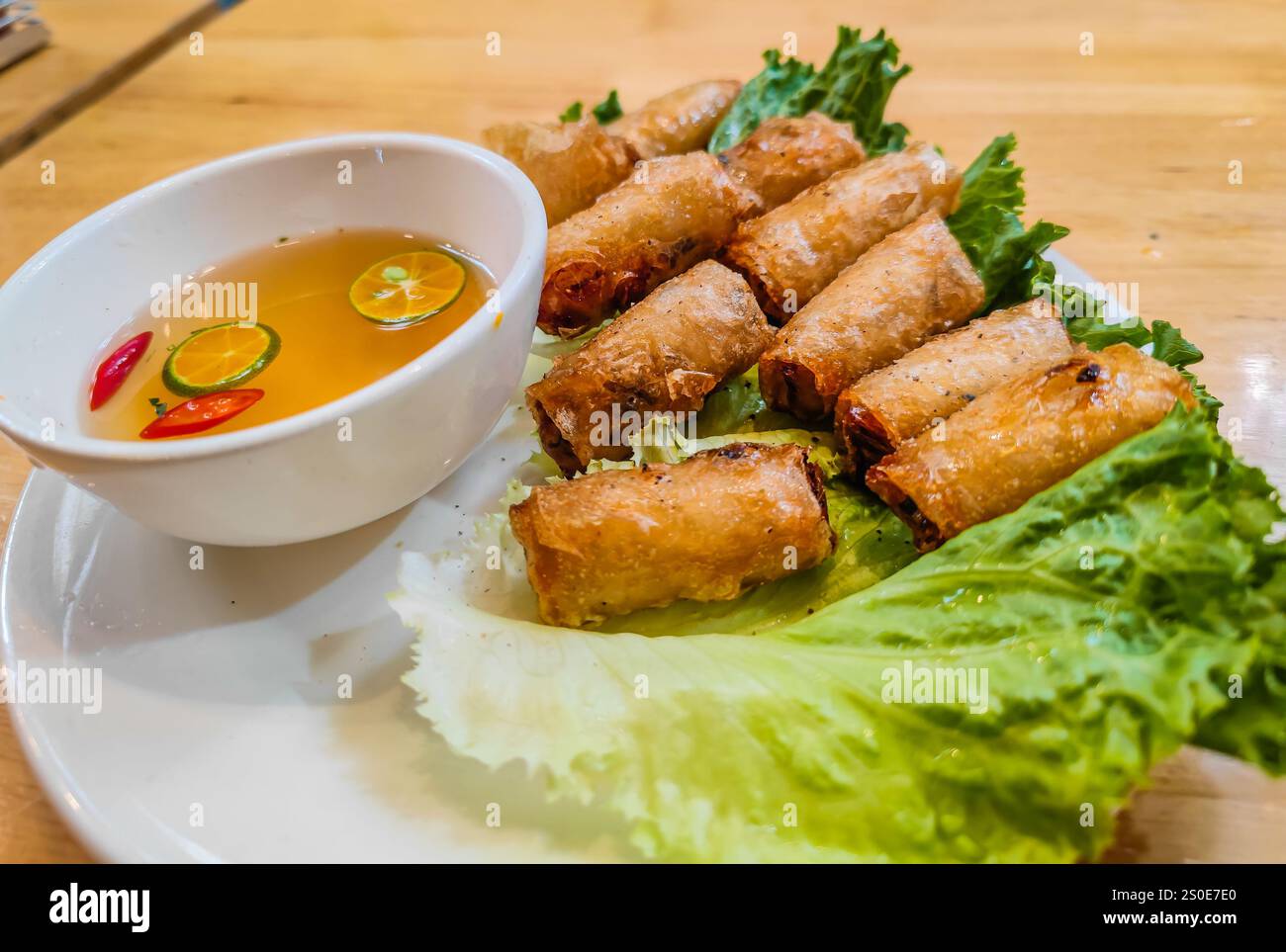 Deep fried spring rolls with sauce at a local Vietnamese street food ...