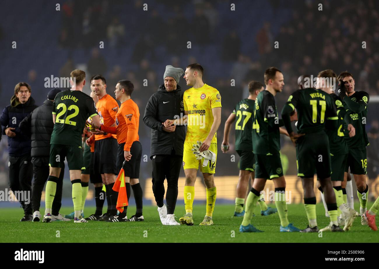 Brentford goalkeeper Hakon Rafn Valdimarsson (centre right) is ...