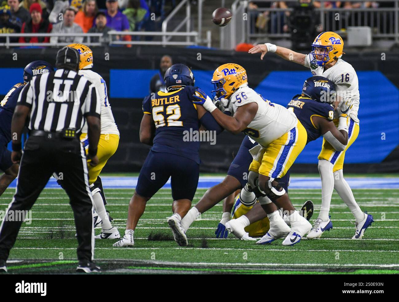 Detroit. 26th Dec, 2024. Pitt QB David Lynch (16) releases the ball ...