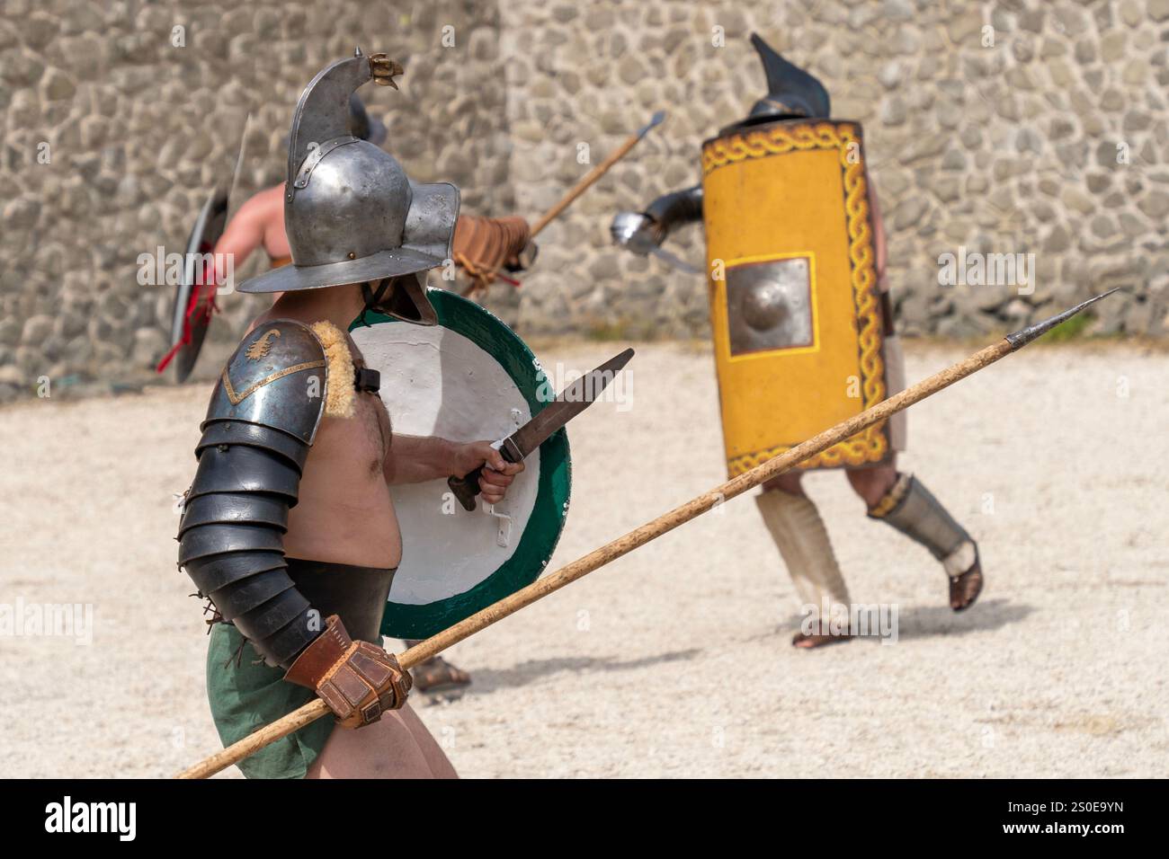 Gladiators fight in a historical arena Stock Photo - Alamy