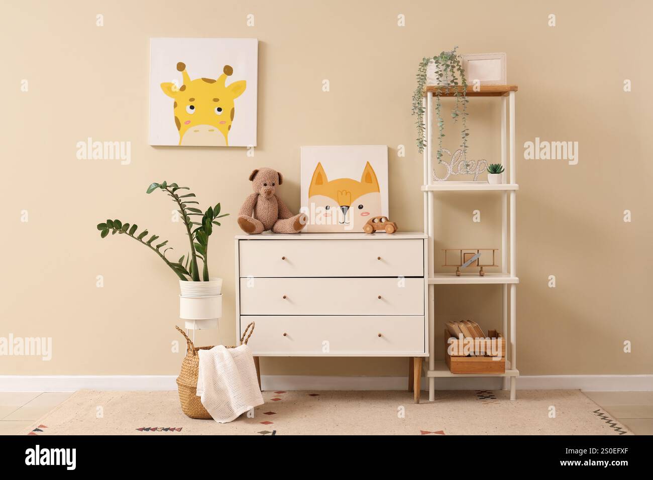 Interior of nursery with commode, shelf unit and pictures Stock Photo ...