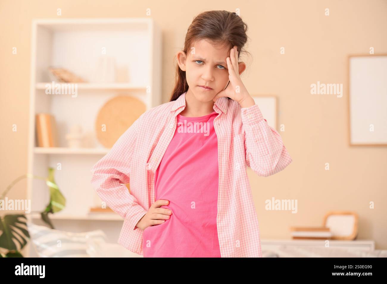 Teenage girl with appendicitis at home Stock Photo - Alamy
