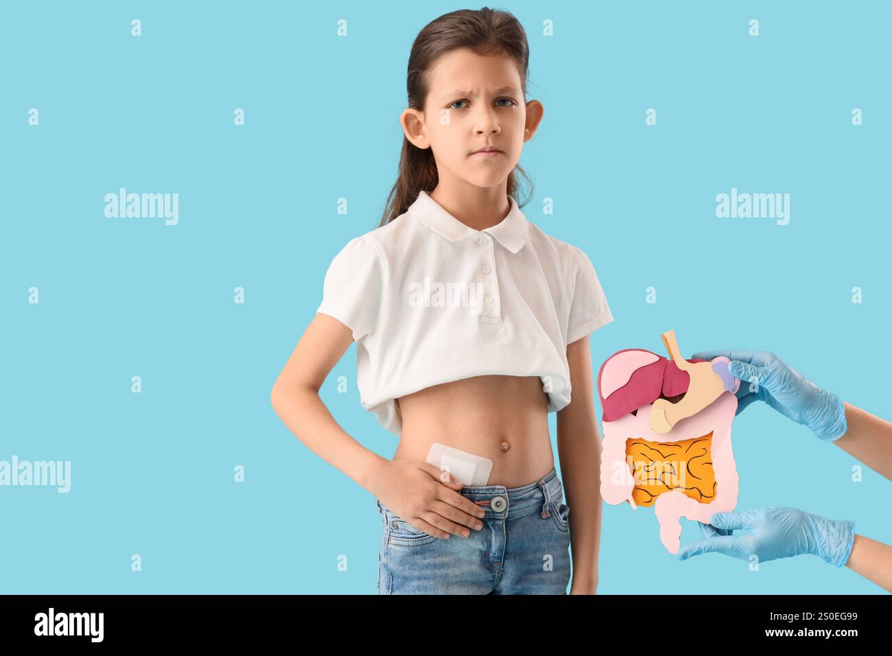Teenage girl after appendectomy surgery and doctor with paper digestive ...