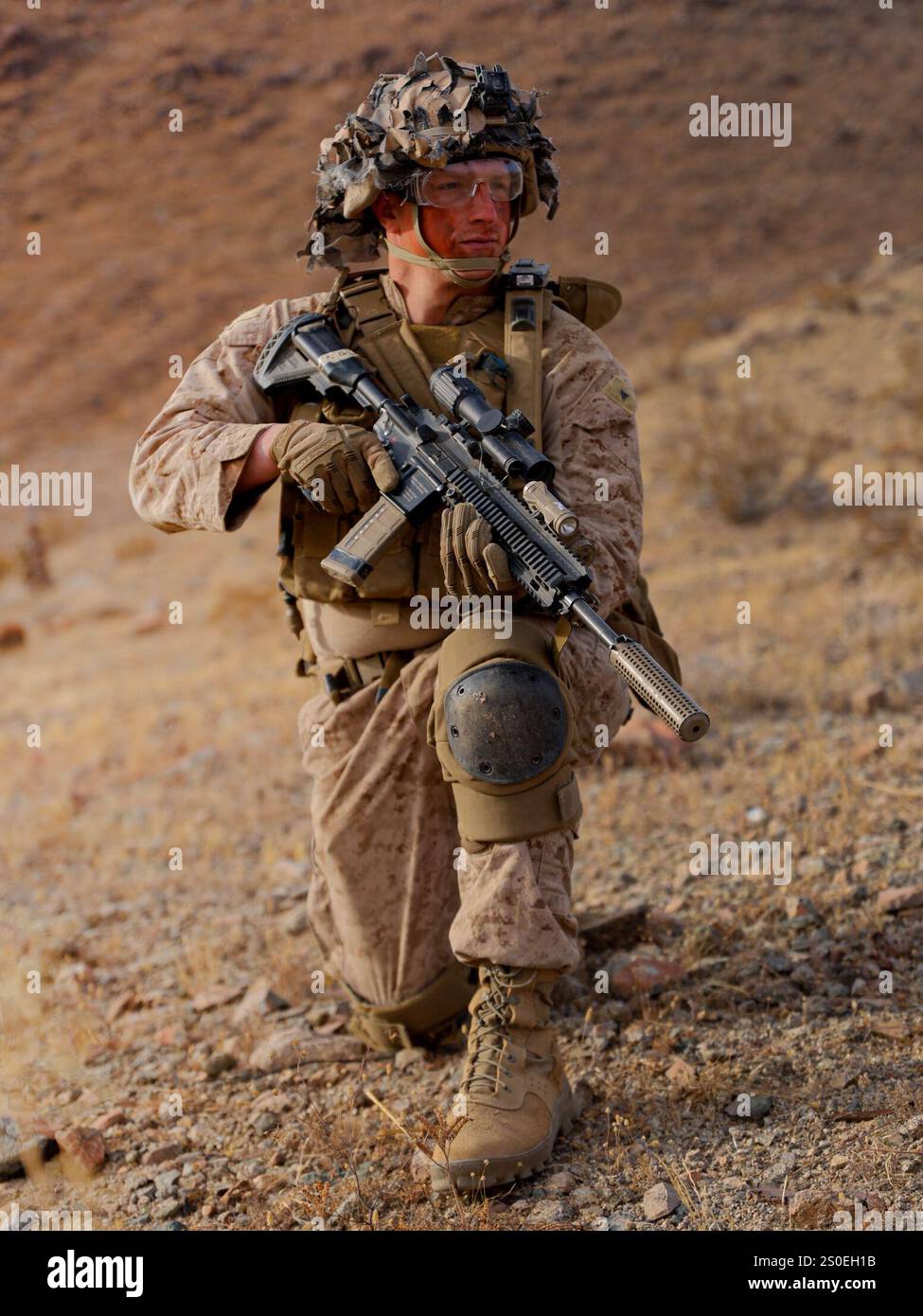 U.S. Marine Corps Lance Cpl. Austin Dennison posts security during an ...