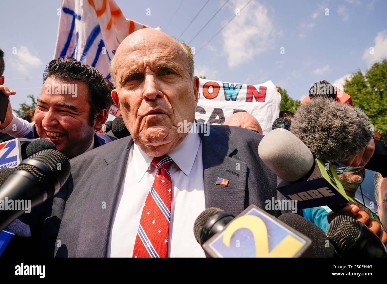 FILE - Rudy Giuliani speaks outside the Fulton County jail in Atlanta ...