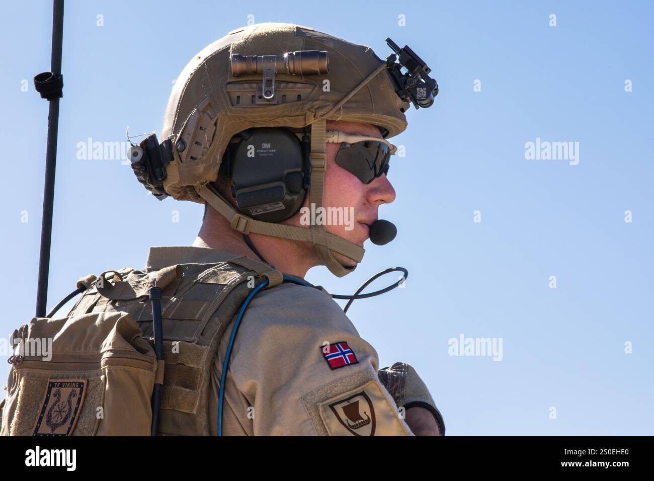 A Norwegian Army service member from Task Force Viking responds to ...