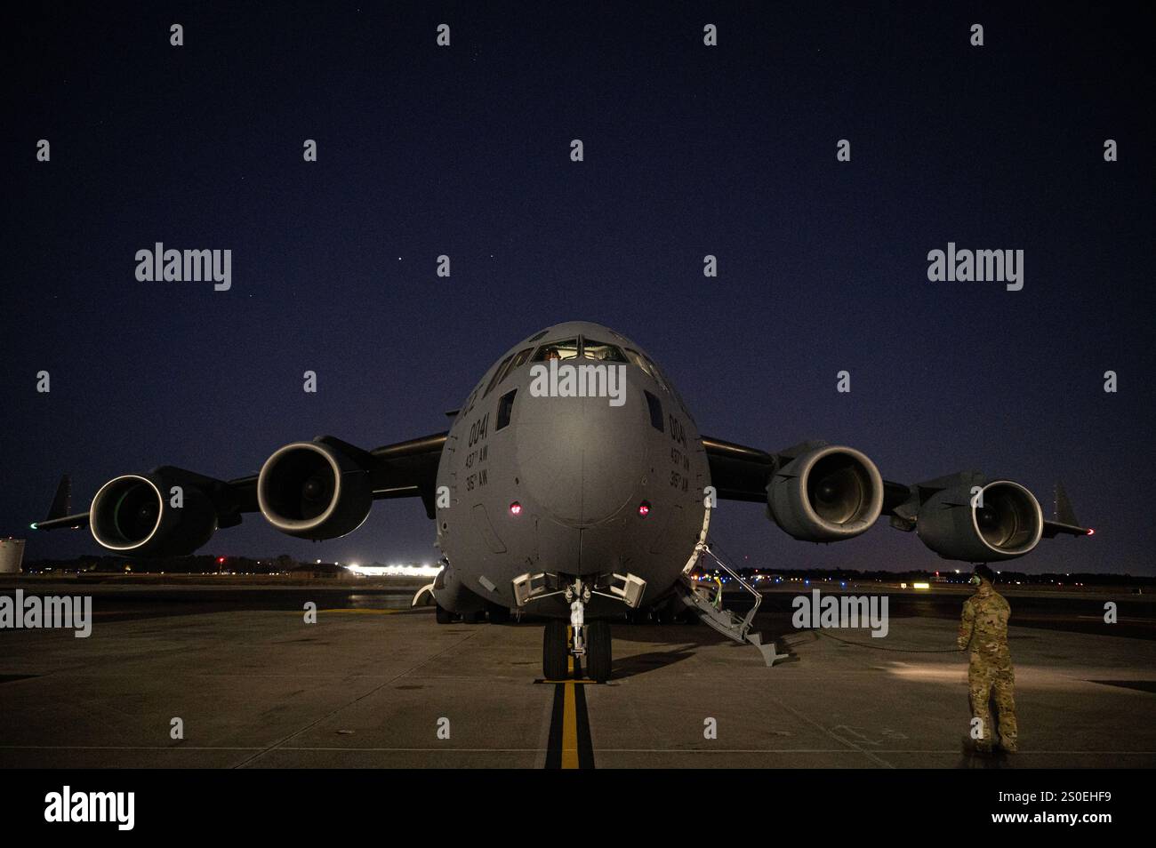 U.S. Air Force Airman 1st Class Joshua De Leon, 14th Airlift Squadron loadmaster, stands outside ...
