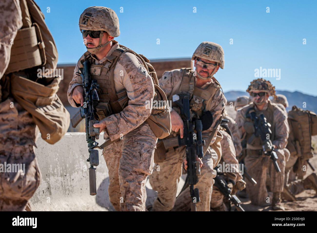U.S. Marines begin to clear a building as a part of a squad urban ...