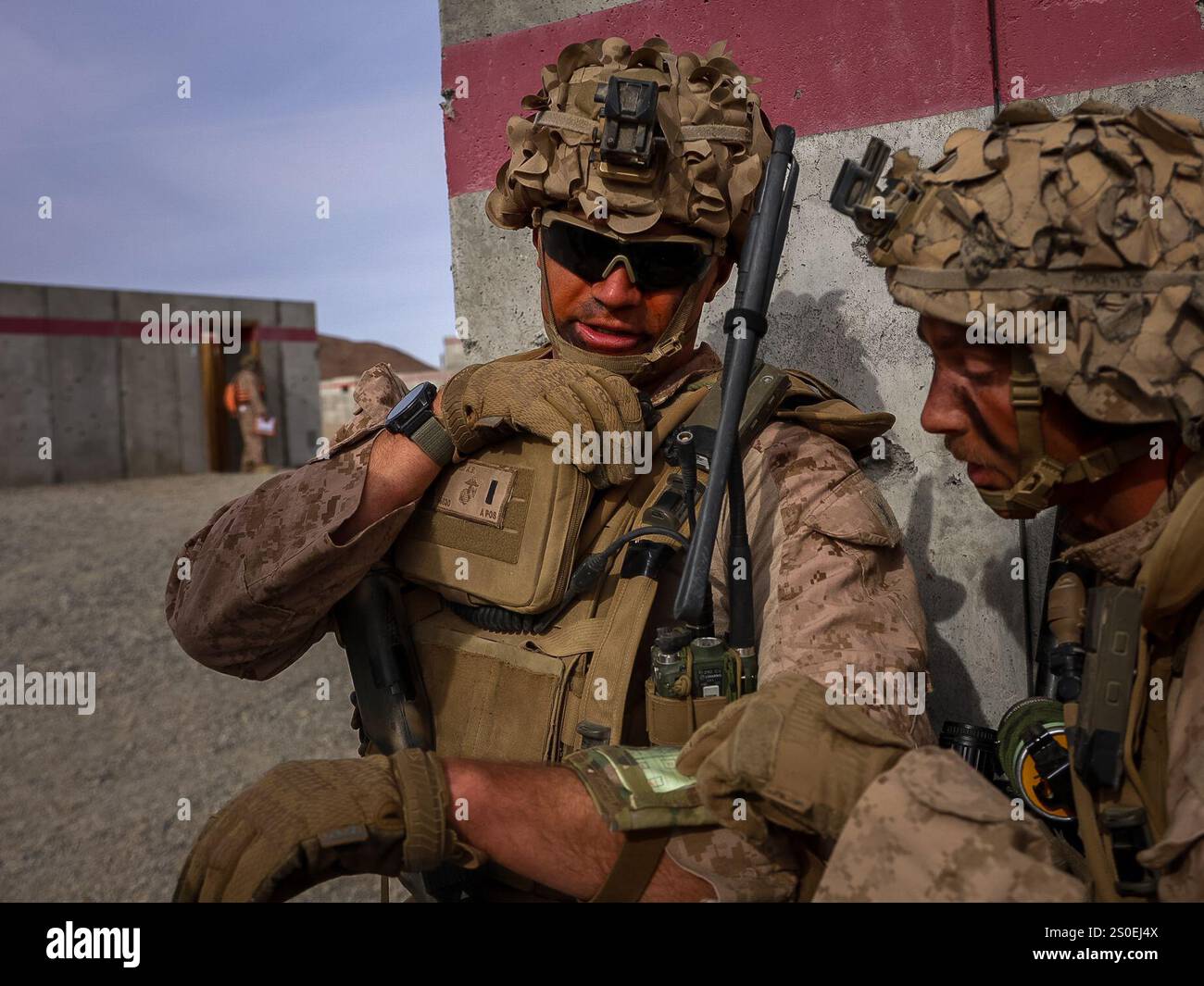 U.S. Marine Corps 1st Lt. Alex Allred, left, and Sgt. Parker Mathys ...