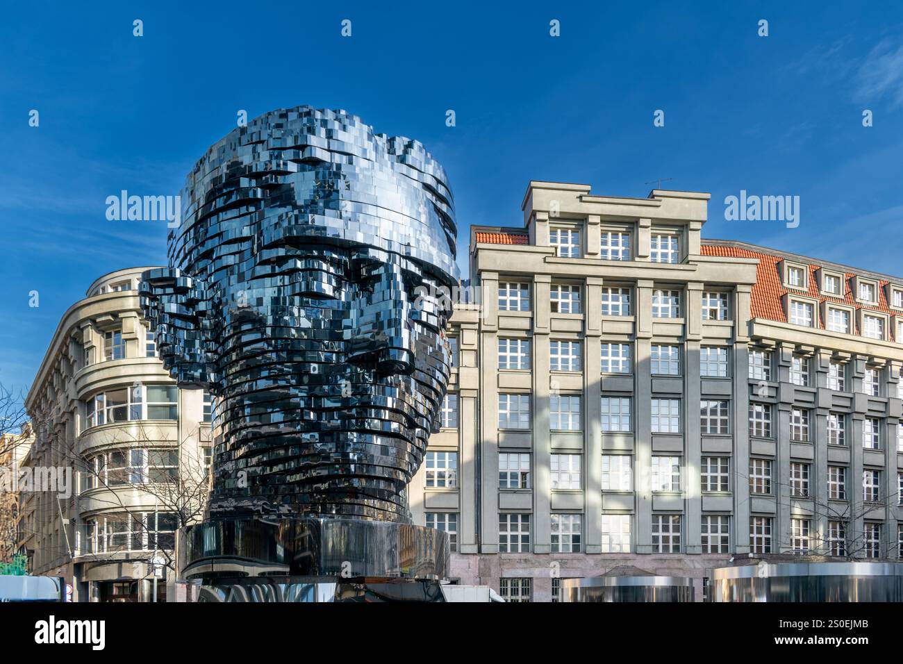 Prague, Czech Republic - Dec. 20, 2024: The moving Franz Kafka monument ...