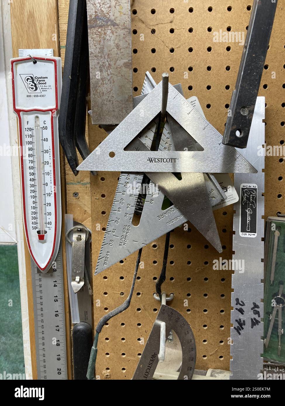 Triangles and squares on a pegboard Stock Photo - Alamy