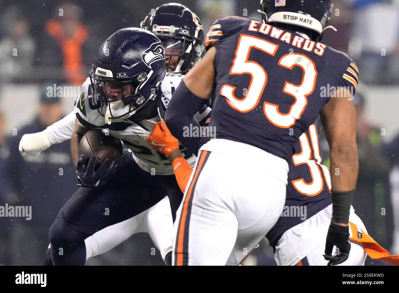 Seattle Seahawks running back Kenny McIntosh (25) is tackled by Chicago ...