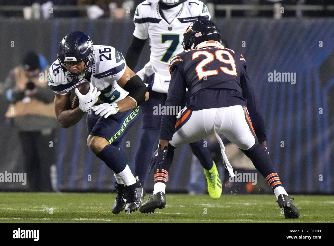 Seattle Seahawks running back Zach Charbonnet (26) runs against Chicago ...