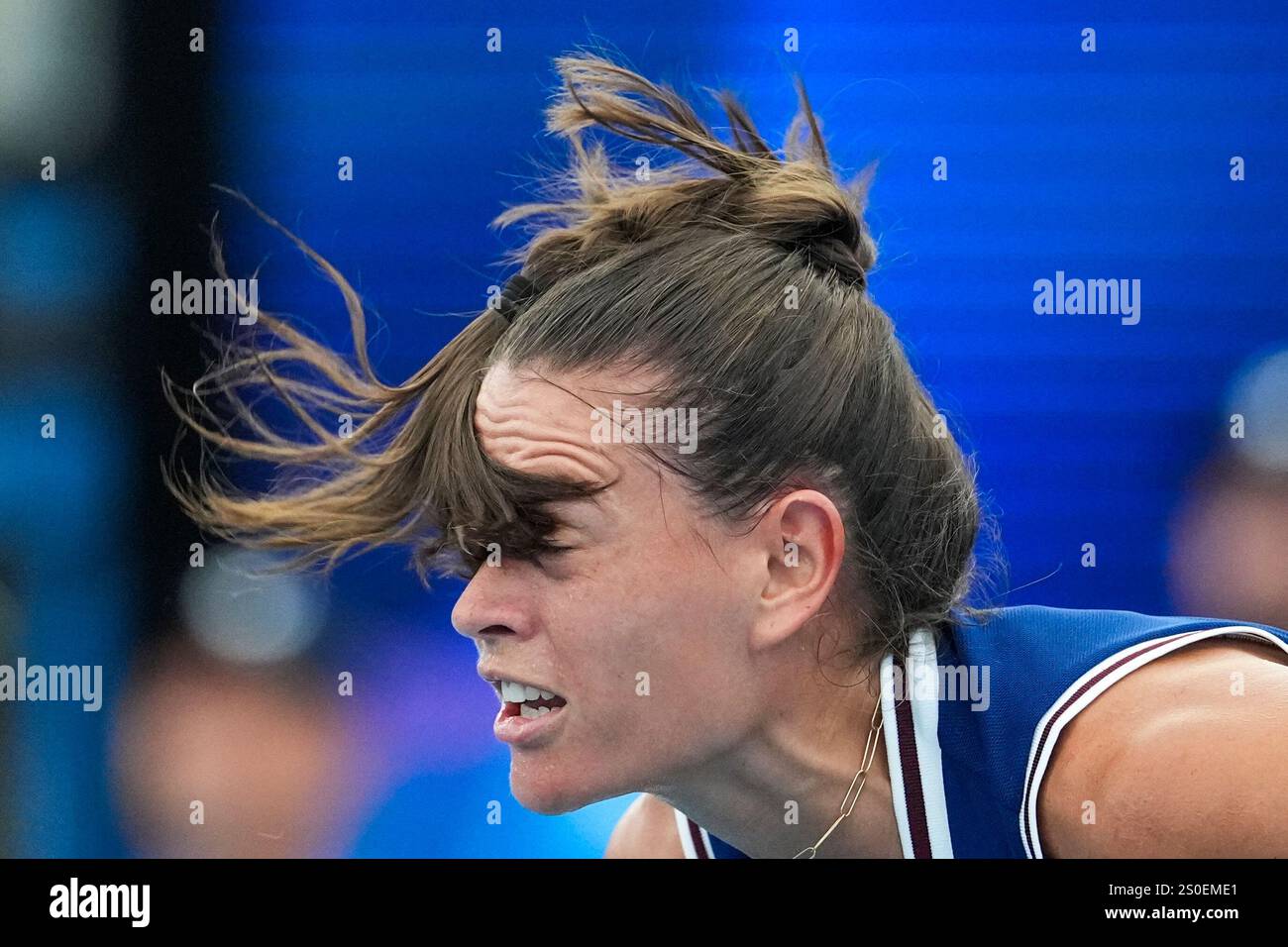 France's Chloe Paquet serves to Switzerland's Belinda Bencic during ...