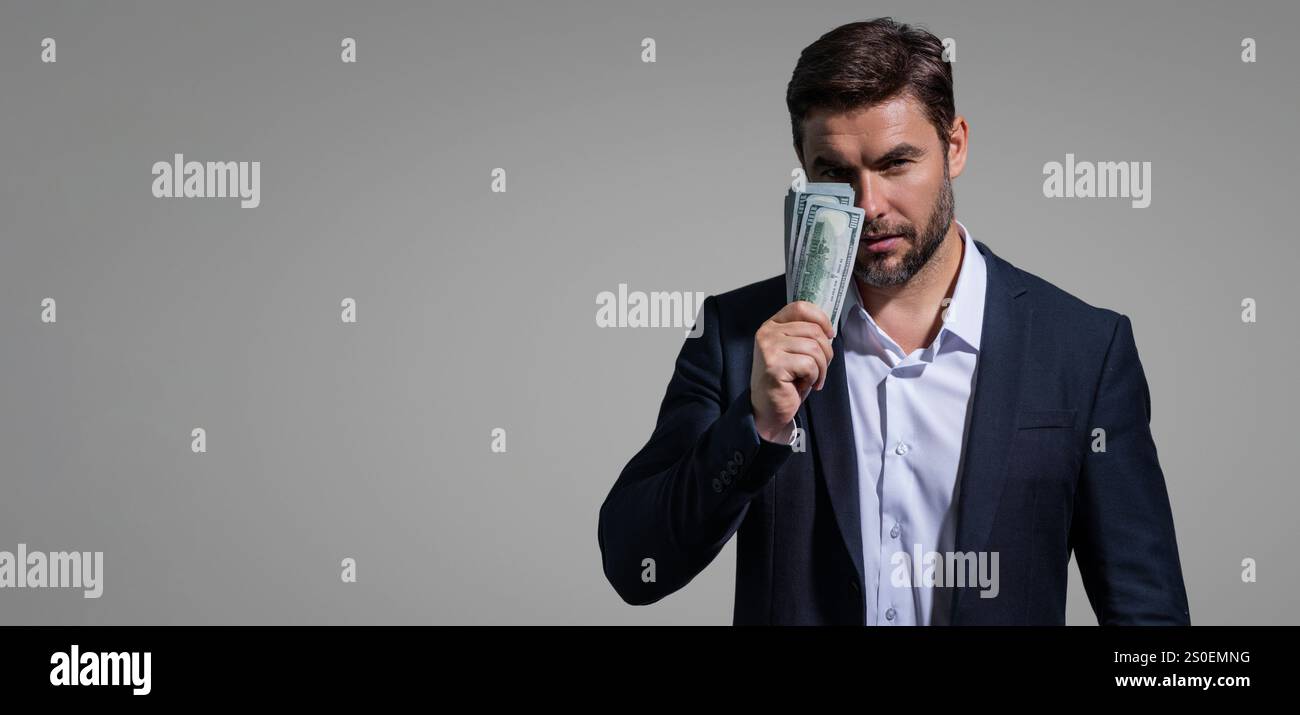 Man in suit with money cash. Dollar Banknotes. Portrait of man holding ...