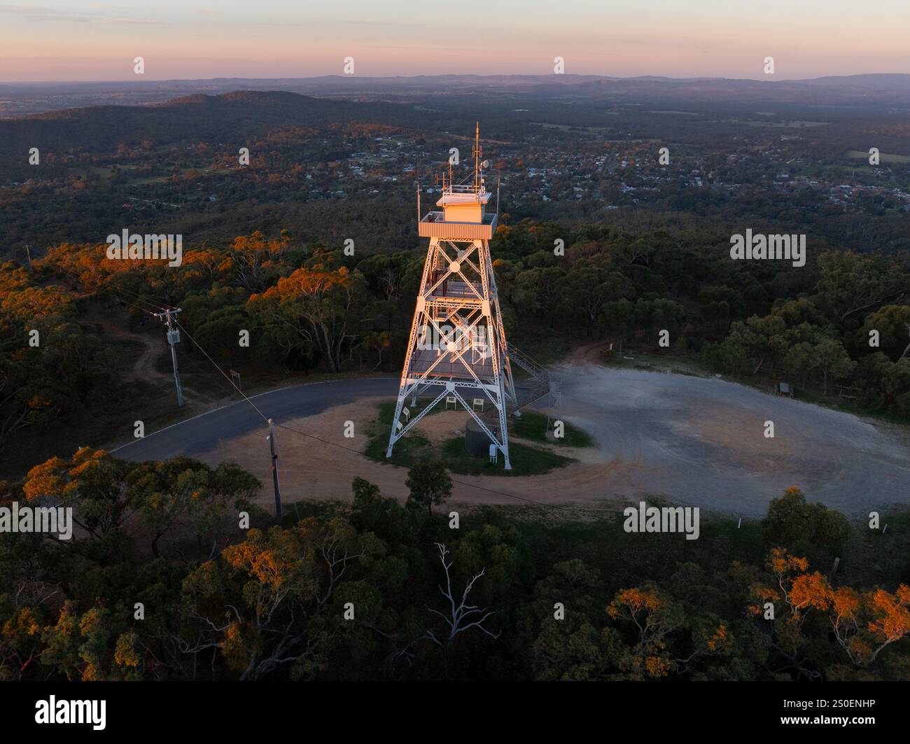 Aerial view of lookout tower ona hilltop during twilight at Maldon in ...