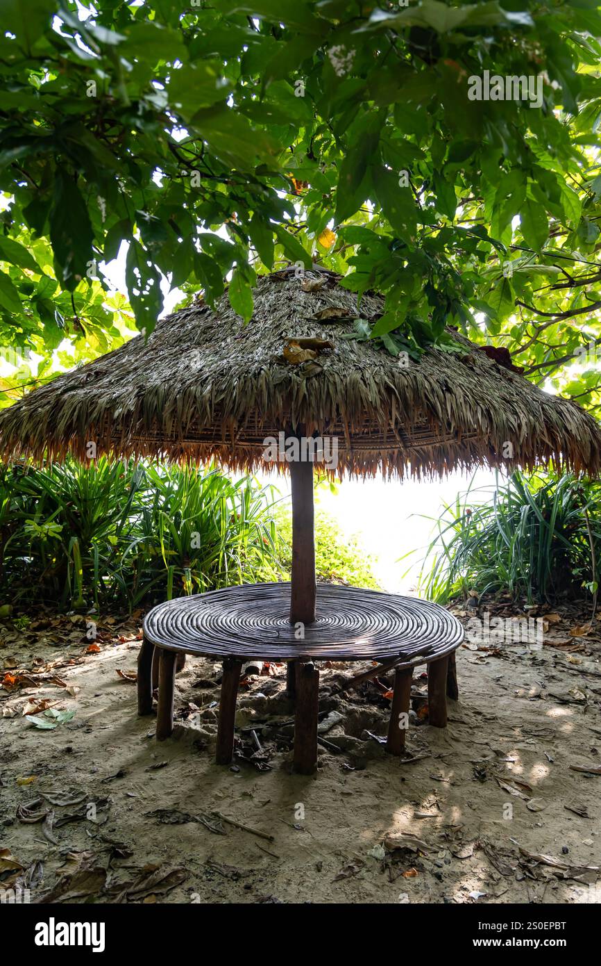 relaxing bamboo hut at sea shore with green tree at morning image is ...