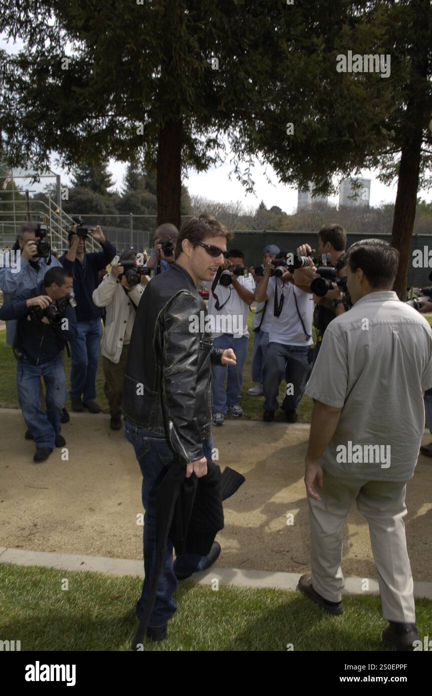 Tom Cruise attends a public event, sporting a black leather jacket and ...