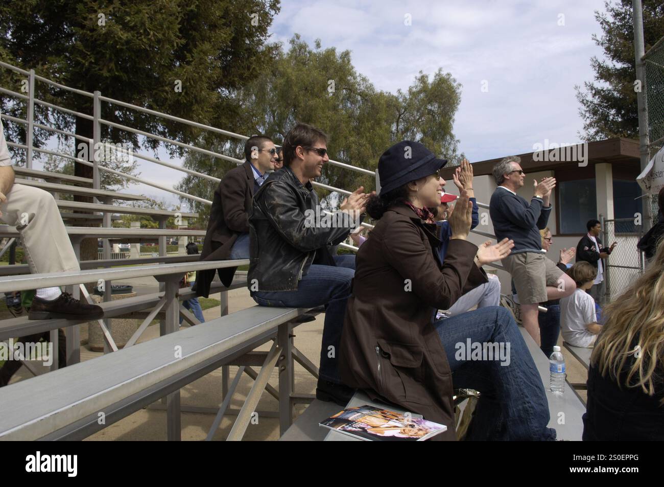 Tom Cruise attends a public event, sporting a black leather jacket and ...