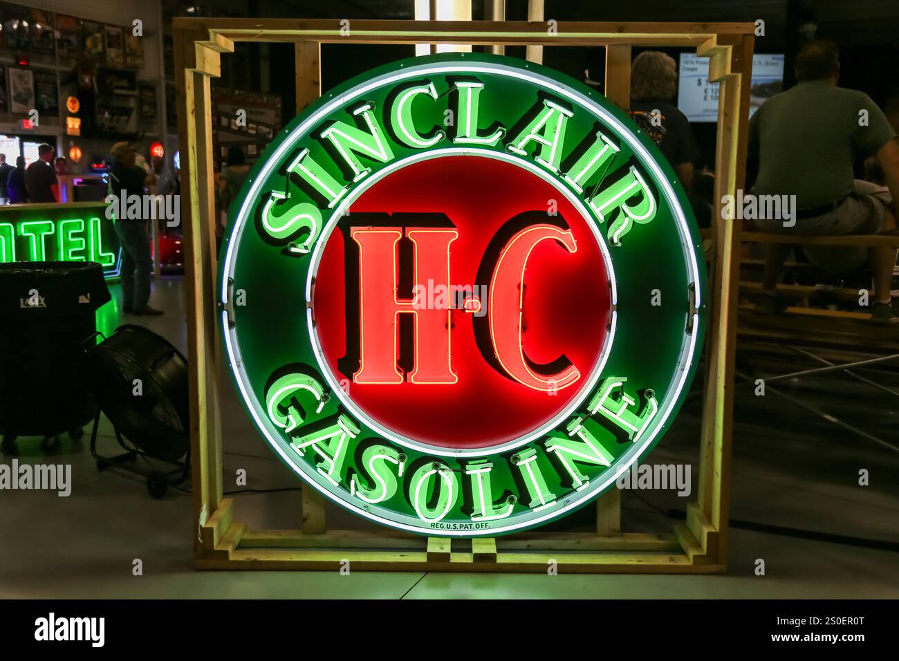 An illuminated neon Sinclair Gasoline sign on display at Worldwide ...