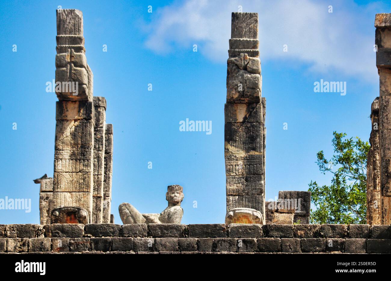 Chac Mool statue,a reclining figure with head turned to 90 degrees ...