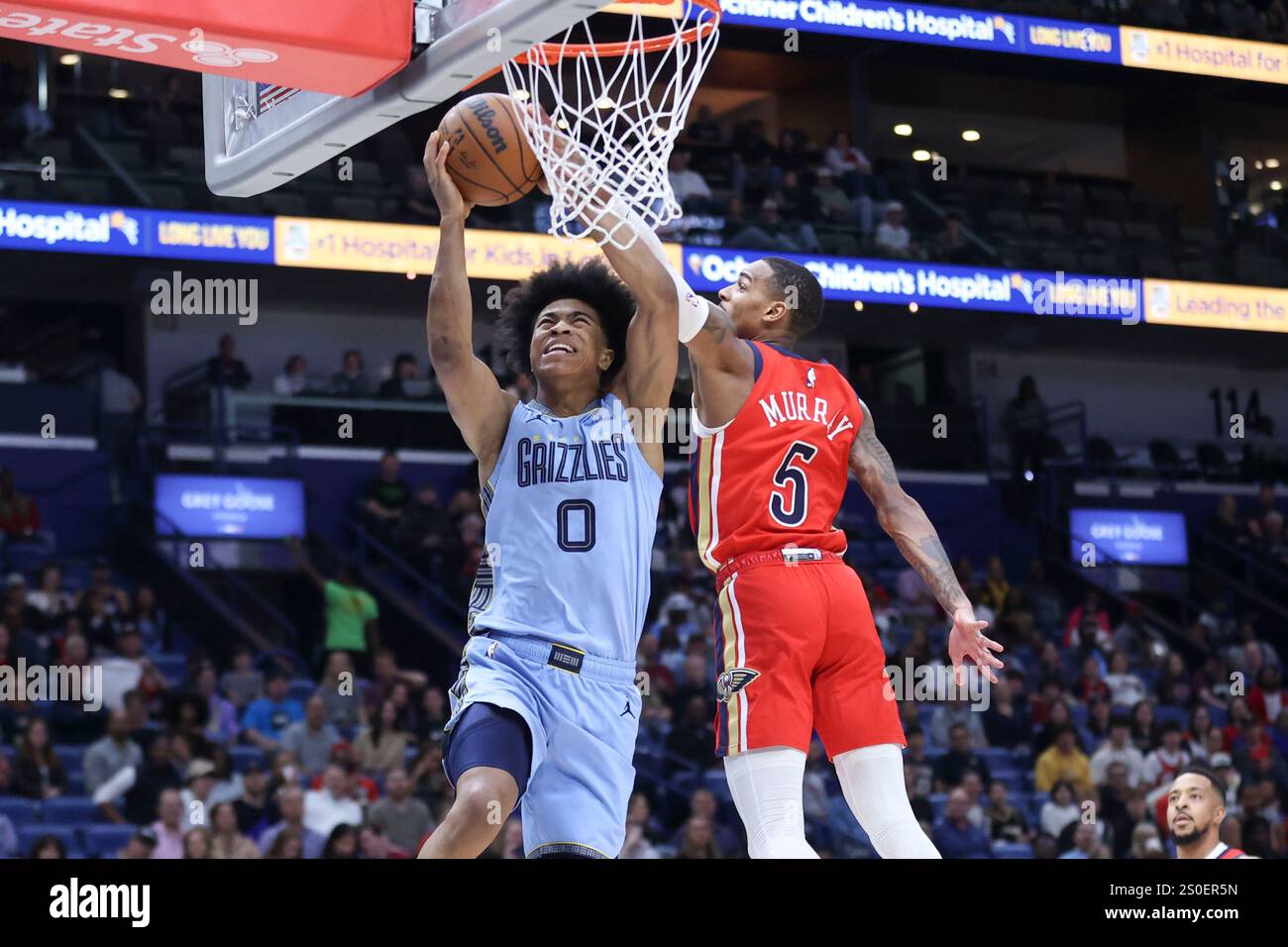 New Orleans Pelicans guard Dejounte Murray (5) tries to block Memphis ...