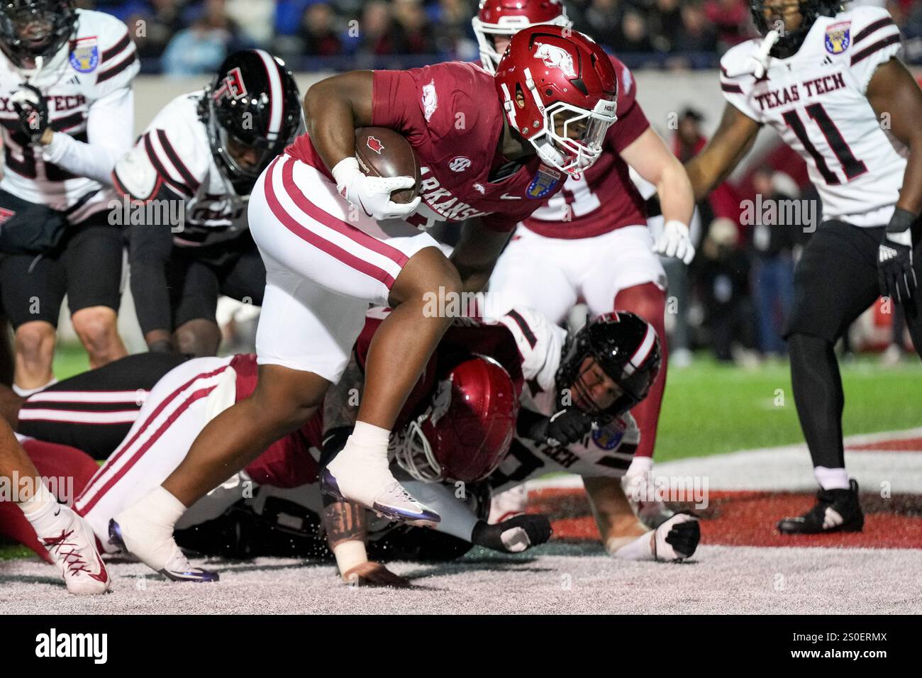 Arkansas running back Braylen Russell runs into the end zone for a ...