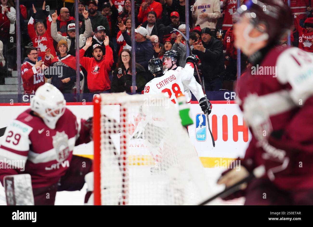 Ottawa, Canada. 27th Dec, 2024. Canada's Jett Luchanko (centre right ...