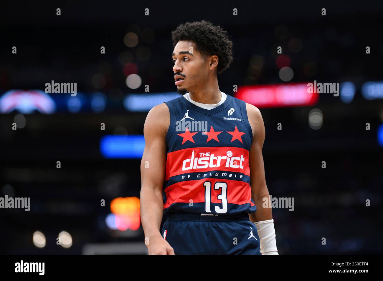 Washington Wizards guard Jordan Poole (13) looks on during a break in ...