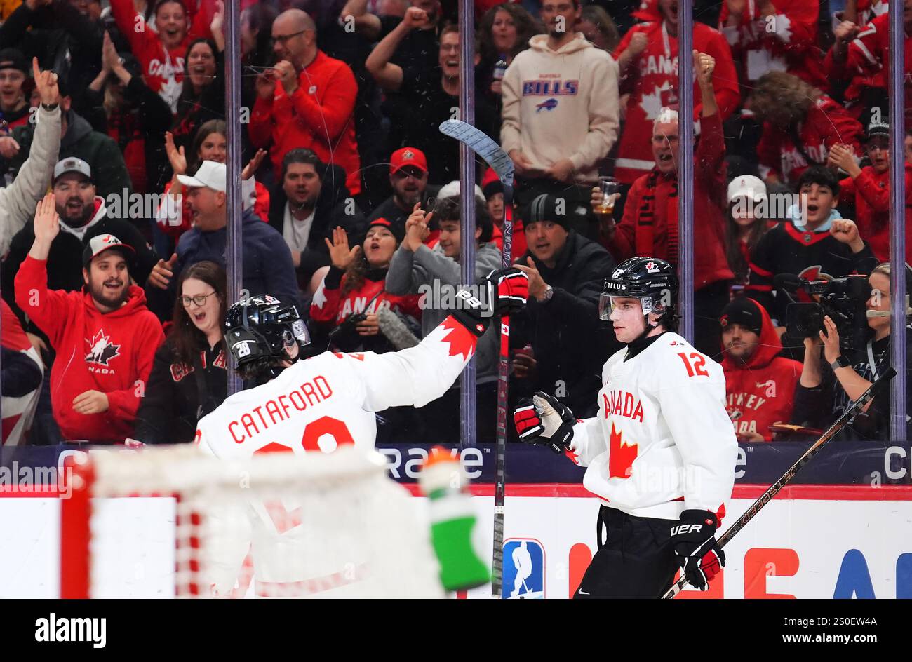 Ottawa, Canada. 27th Dec, 2024. Canada's Jett Luchanko (12) celebrates ...