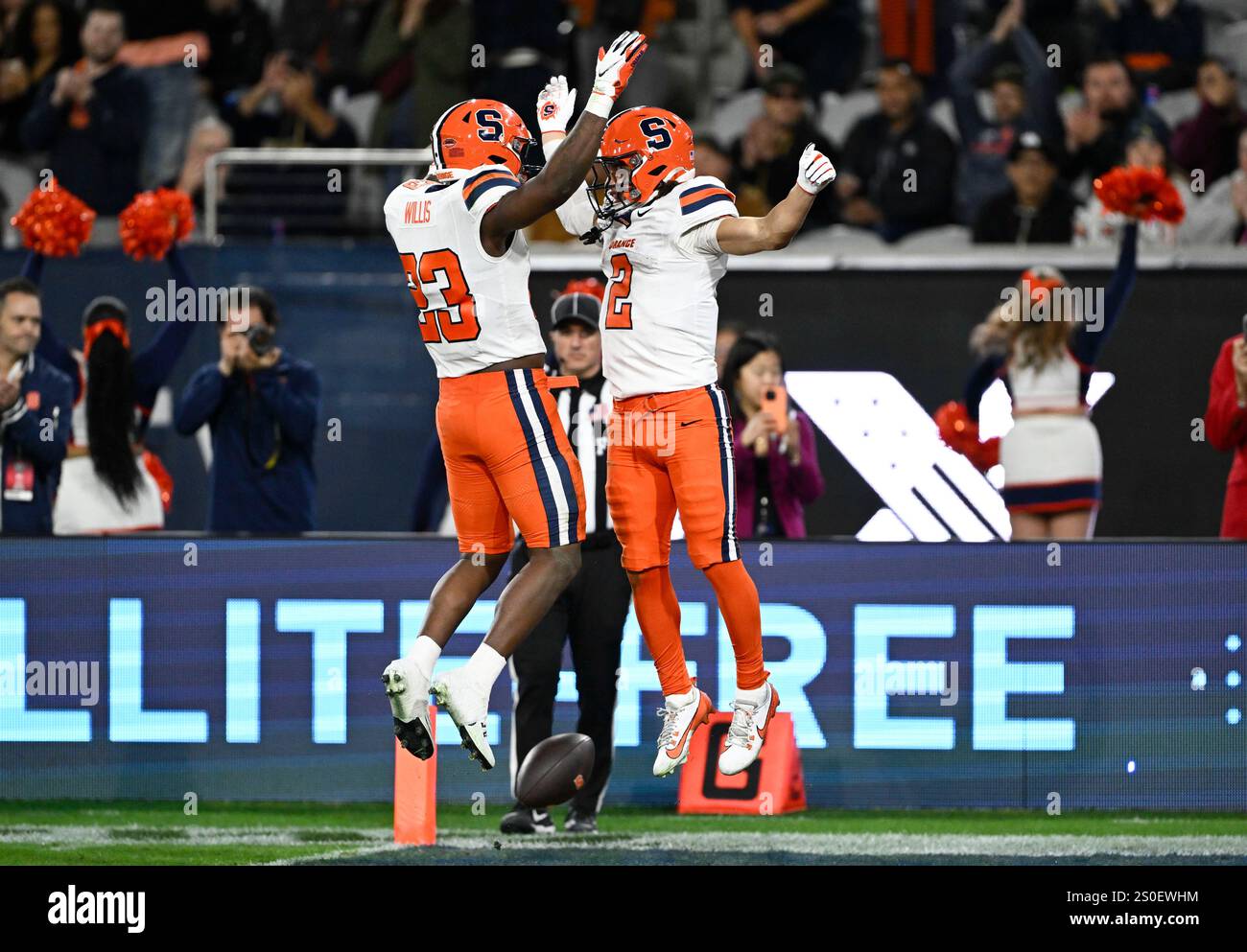 Syracuse wide receiver Trebor Pena (2) celebrates with running back ...