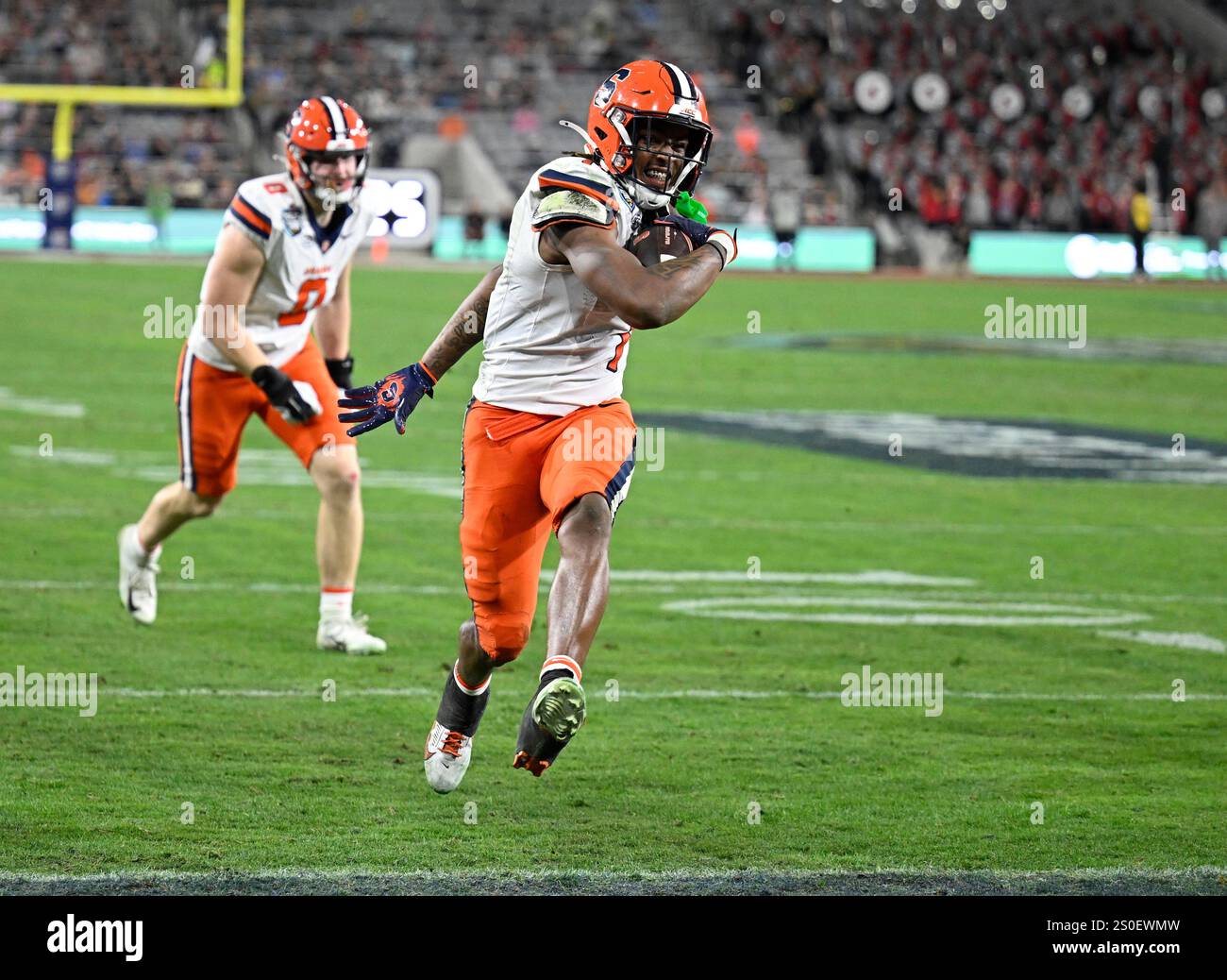 Syracuse running back LeQuint Allen (1) scores on a two-point ...