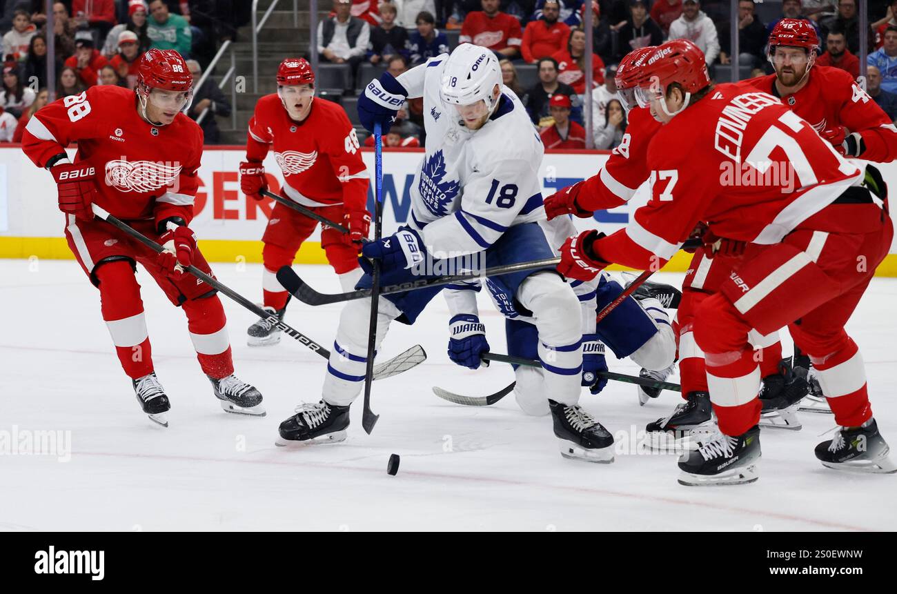 Toronto Maple Leafs center Steven Lorentz (18) tries to advance the ...