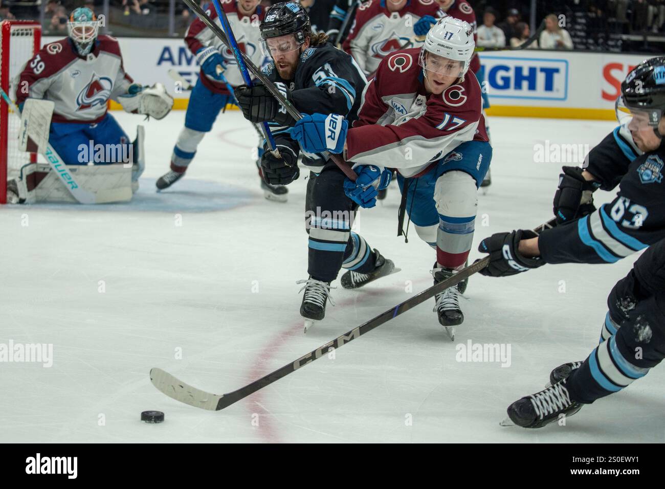 Utah Hockey Club left wing Matias Maccelli (63) reaches for the puck ...
