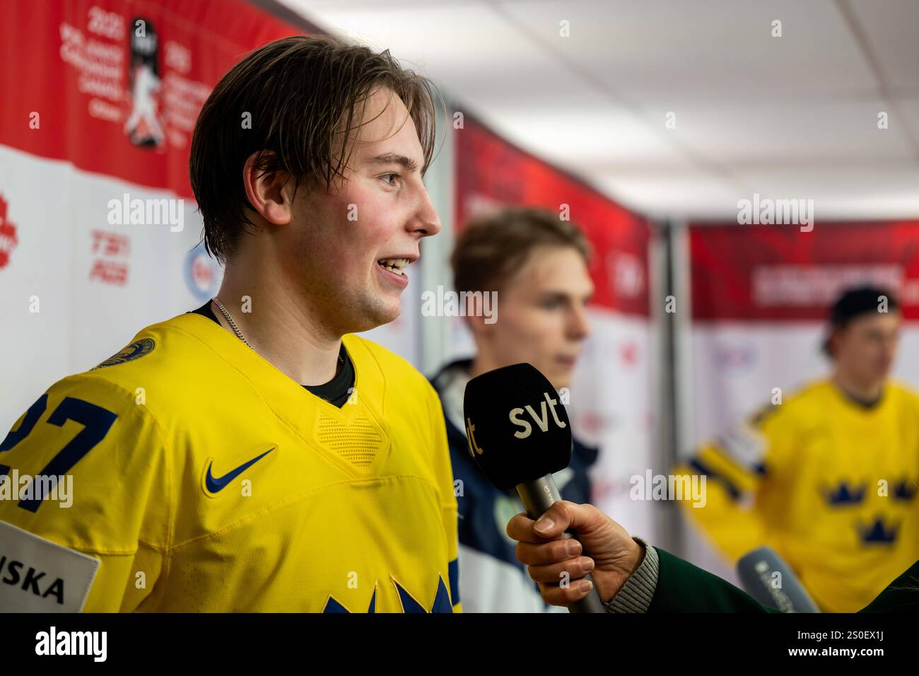David Granberg of, Sweden. , . is interviewed in the mixed zone after ...