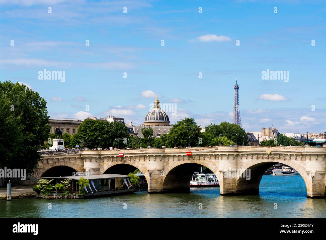 Pont Neuf Bridge over the Seine with the Eiffel Tower behind, Paris ...