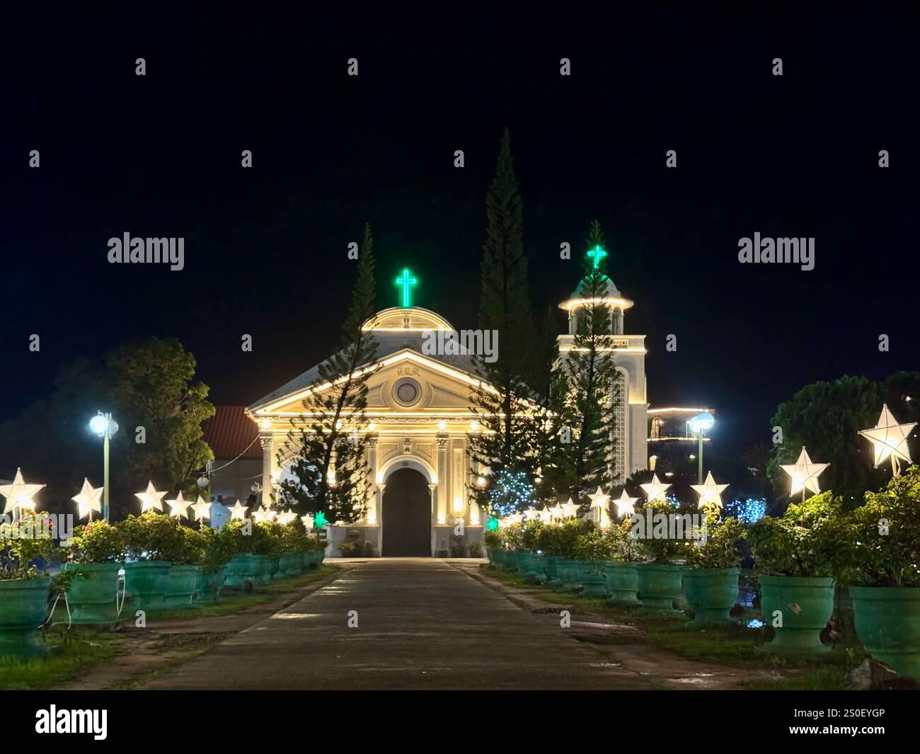 Illuminated Church and Star Decorations at Night Stock Photo - Alamy