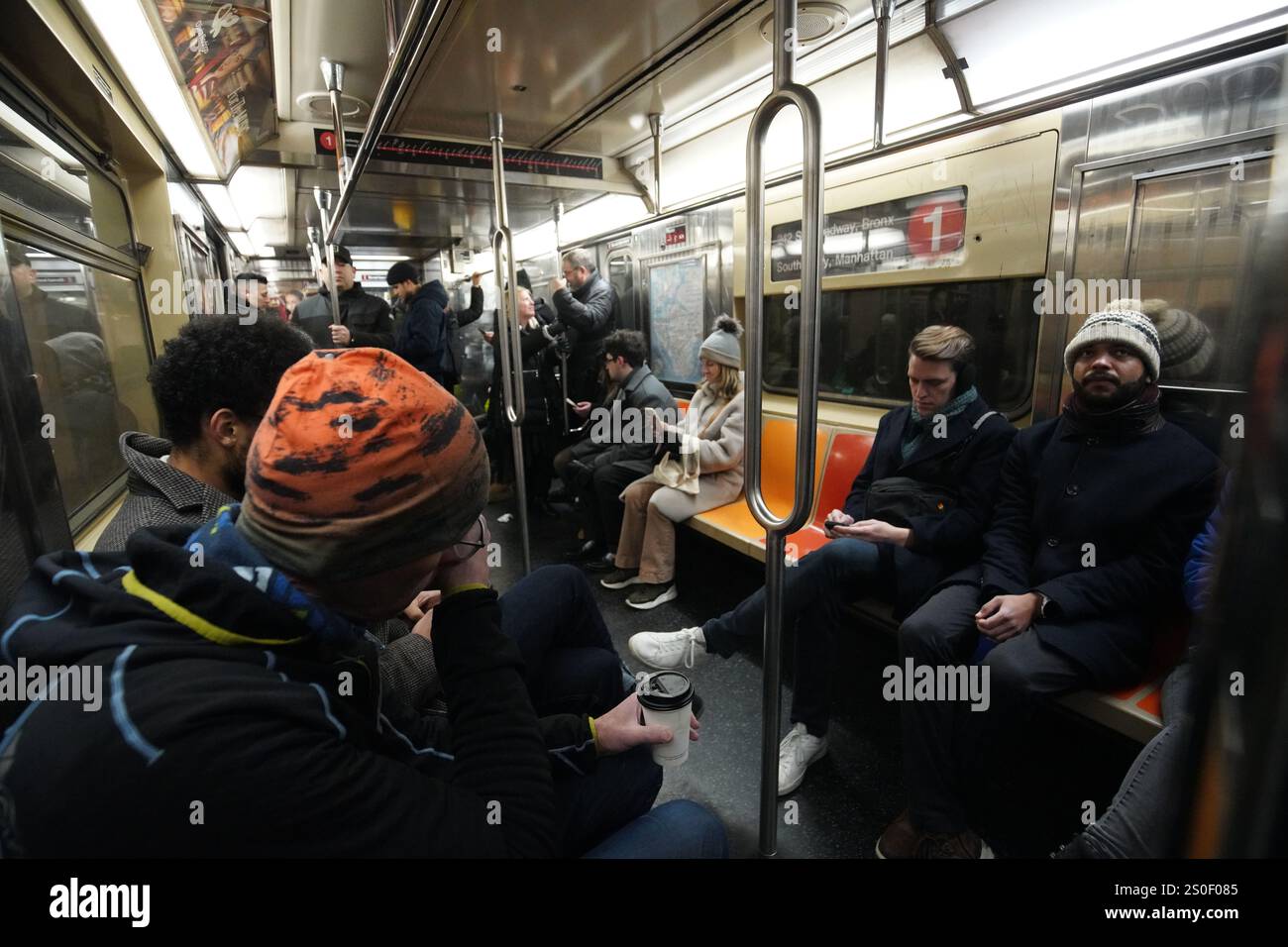 New York, United States. 26th Dec, 2024. People take subway train in ...