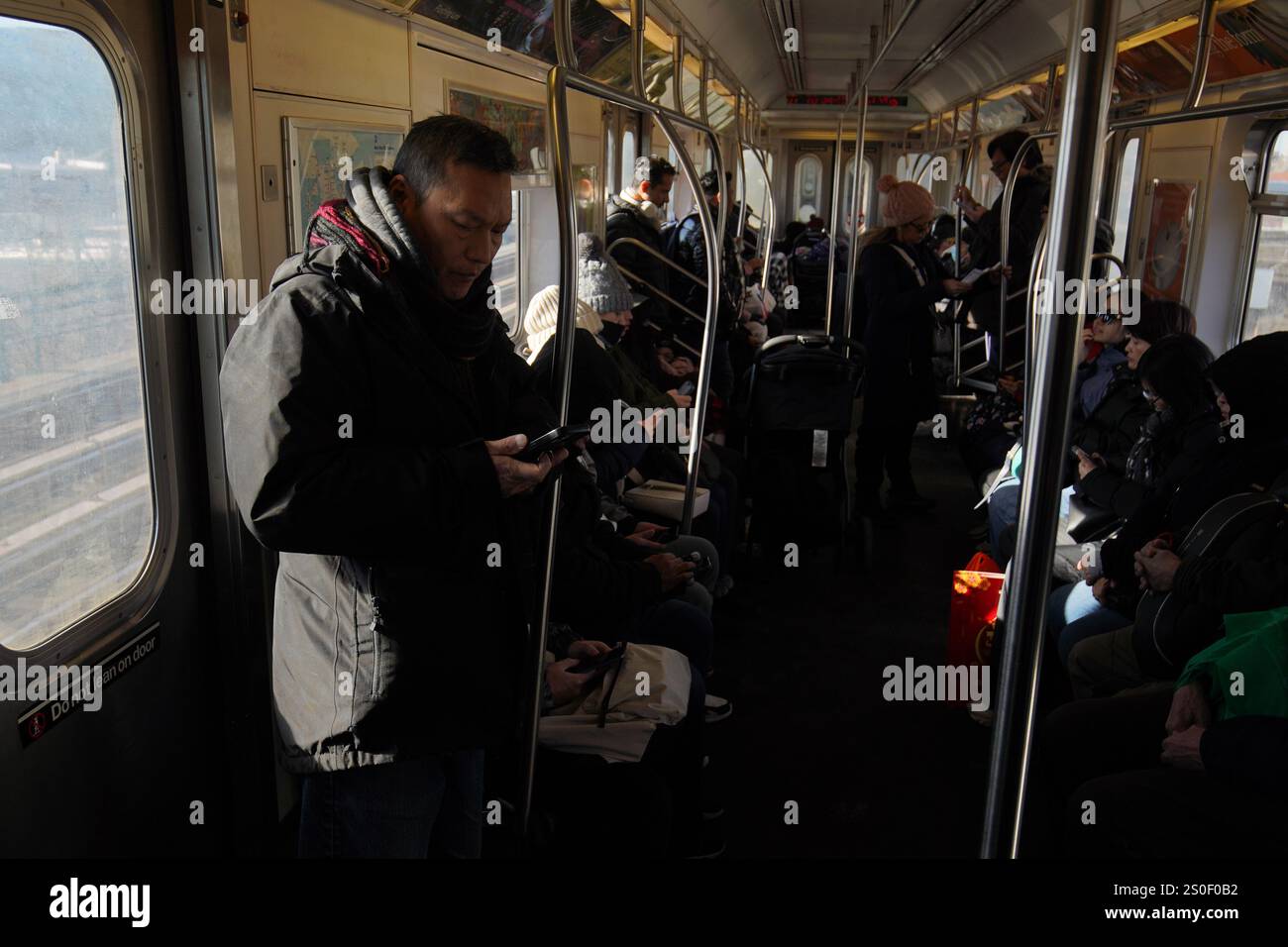 People take subway train in Queens district. Daily life in New York ...