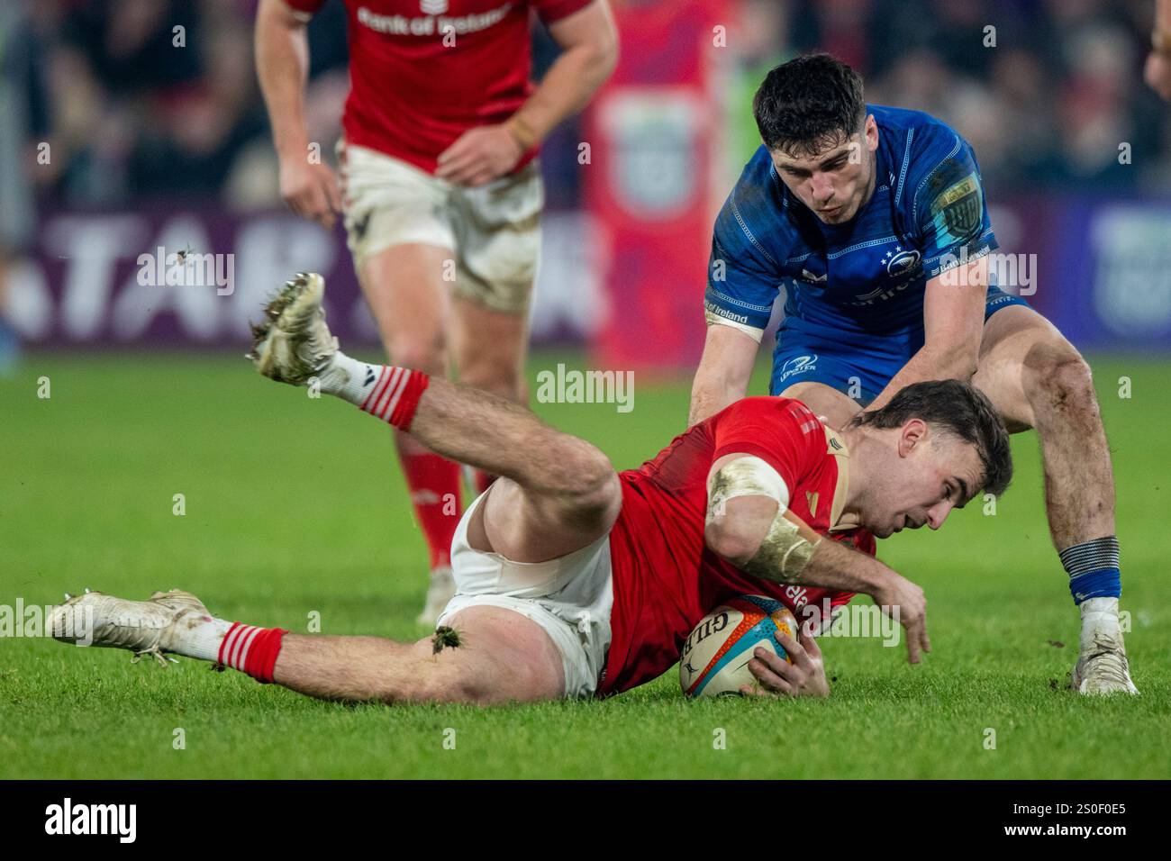 Limerick, Ireland. 28th Dec, 2024. Jimmy O'Brien of Leinster and Shane ...