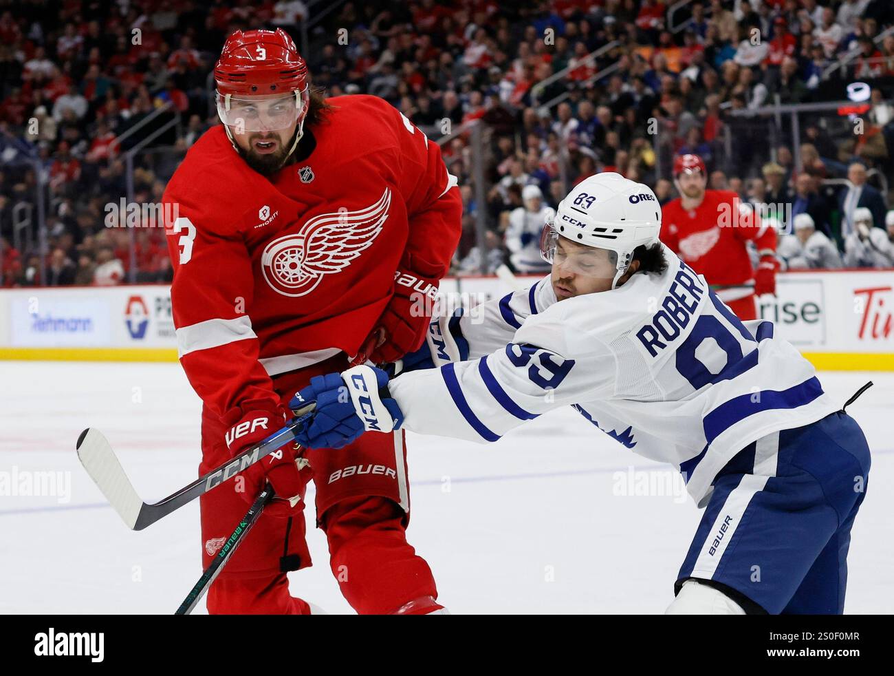 Toronto Maple Leafs left wing Nicholas Robertson (89) checks Detroit ...