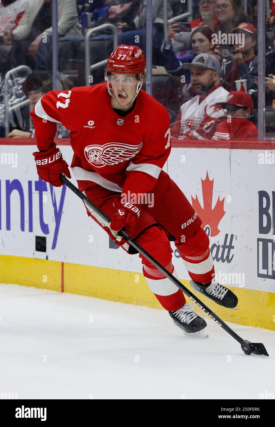 Detroit Red Wings defenseman Simon Edvinsson (77) skates against the ...