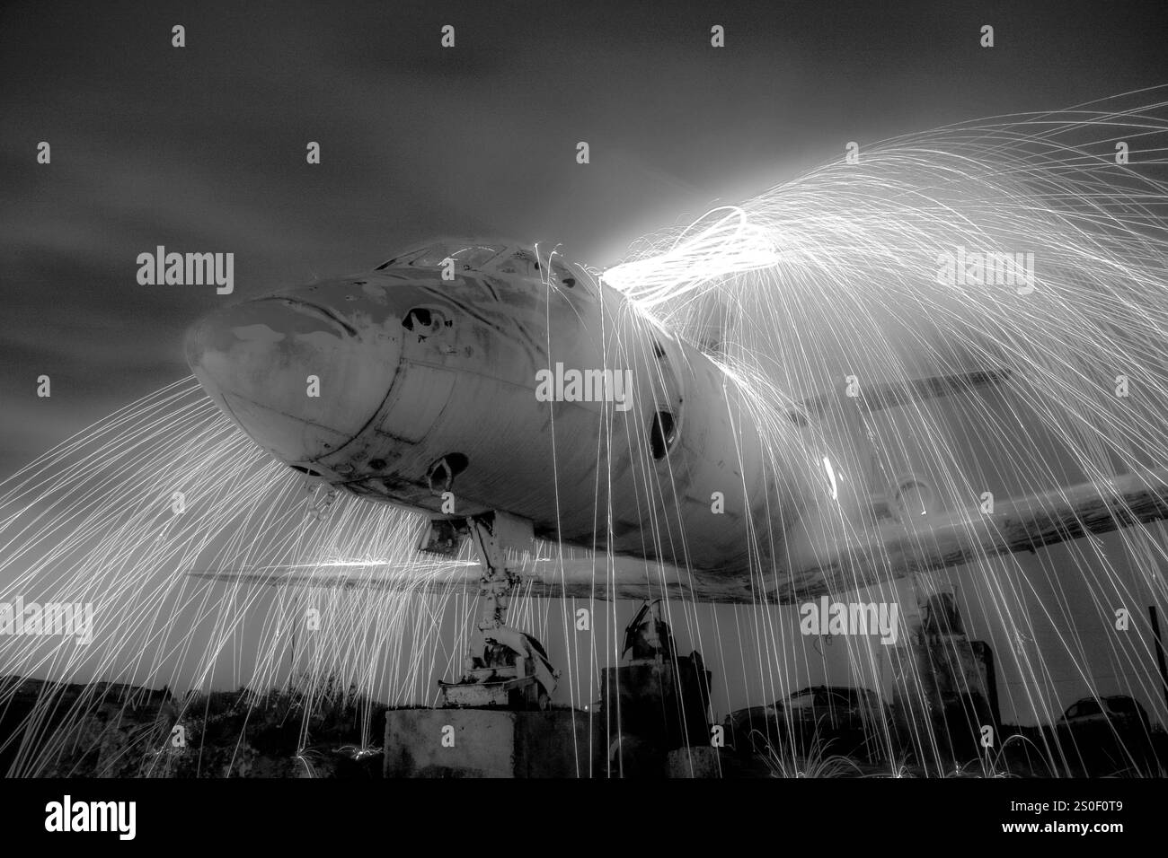 The plane is on fire. Fire show on an old plane. Fireworks on an ...