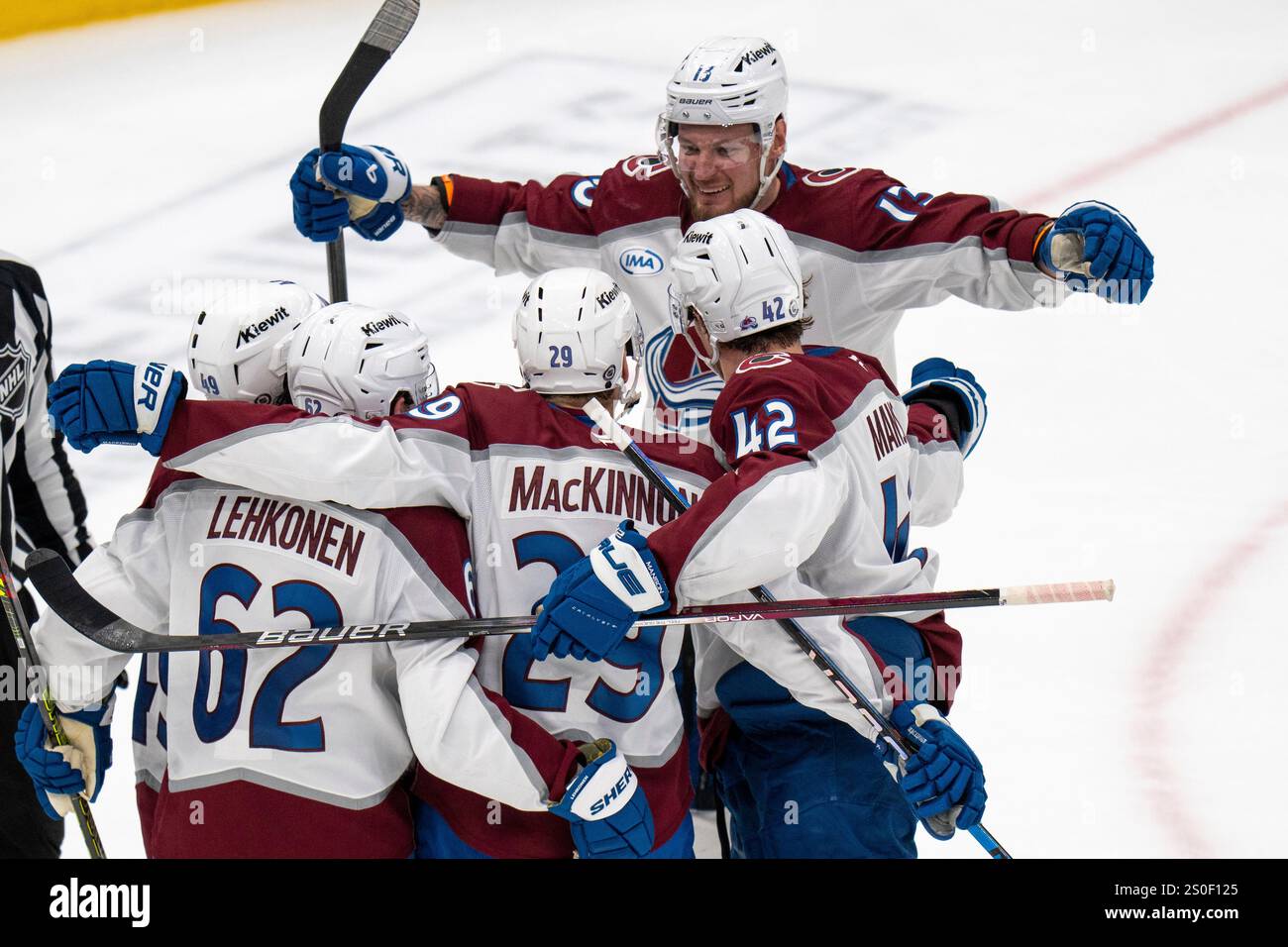 Colorado Avalanche right wing Valeri Nichushkin, top, celebrates ...