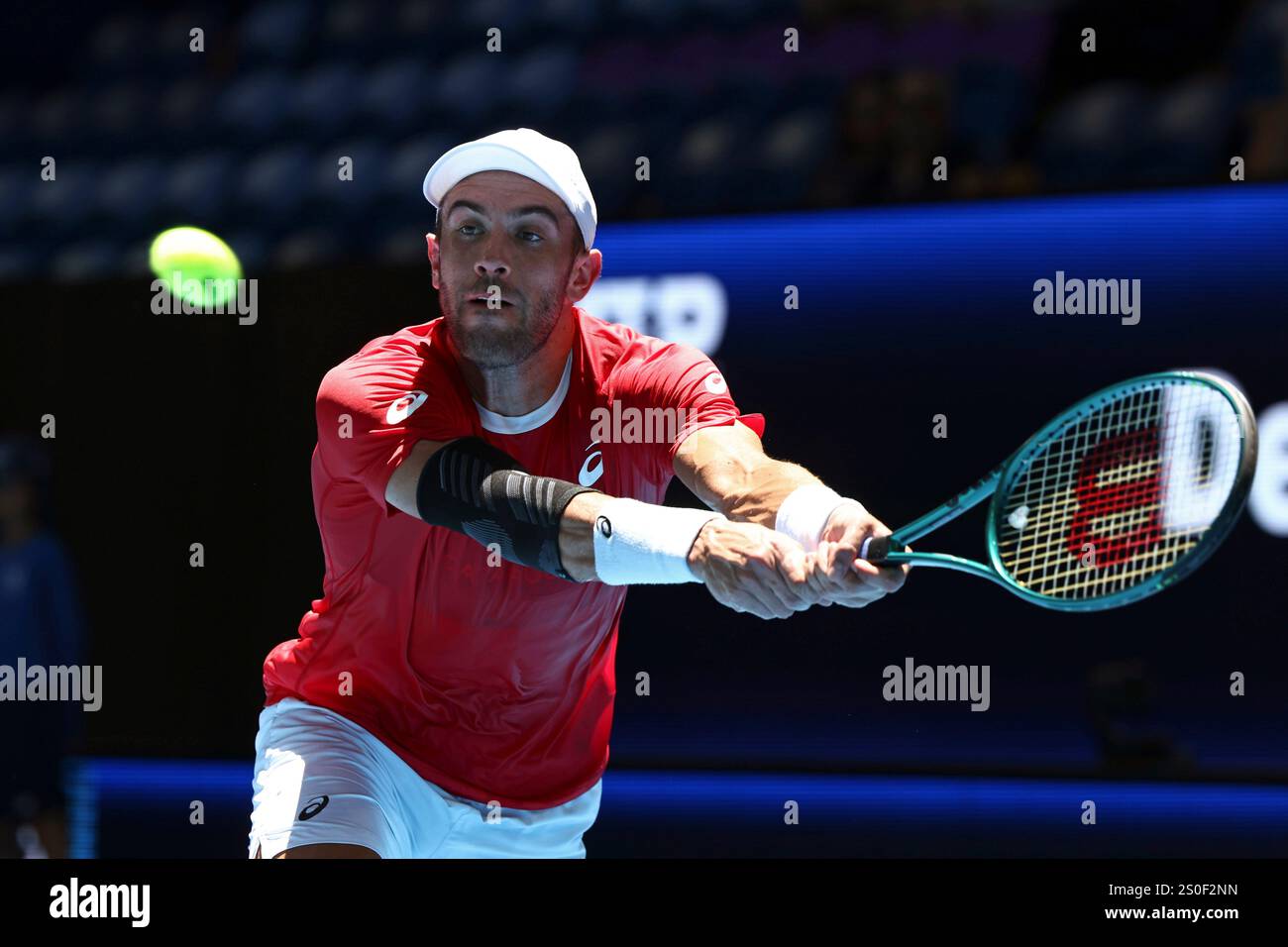 Borna Coric of Croatia plays a forehand shot to opponent Felix Auger ...