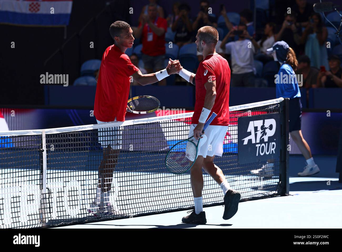 Borna Coric of Croatia, right, shakes hands at the net after defeating ...