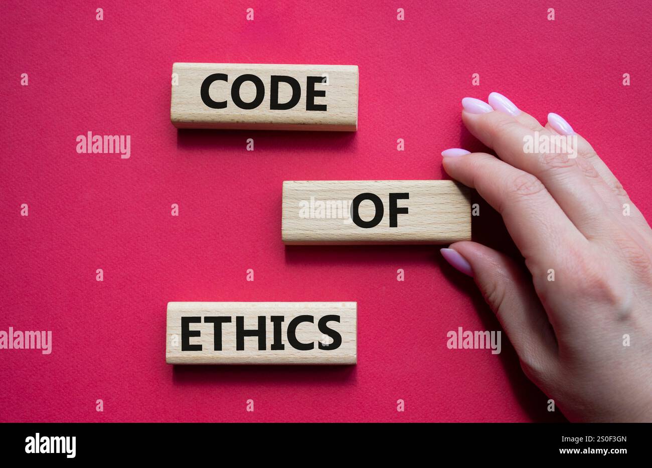 Code of ethics symbol. Concept words Code of ethics on wooden blocks ...