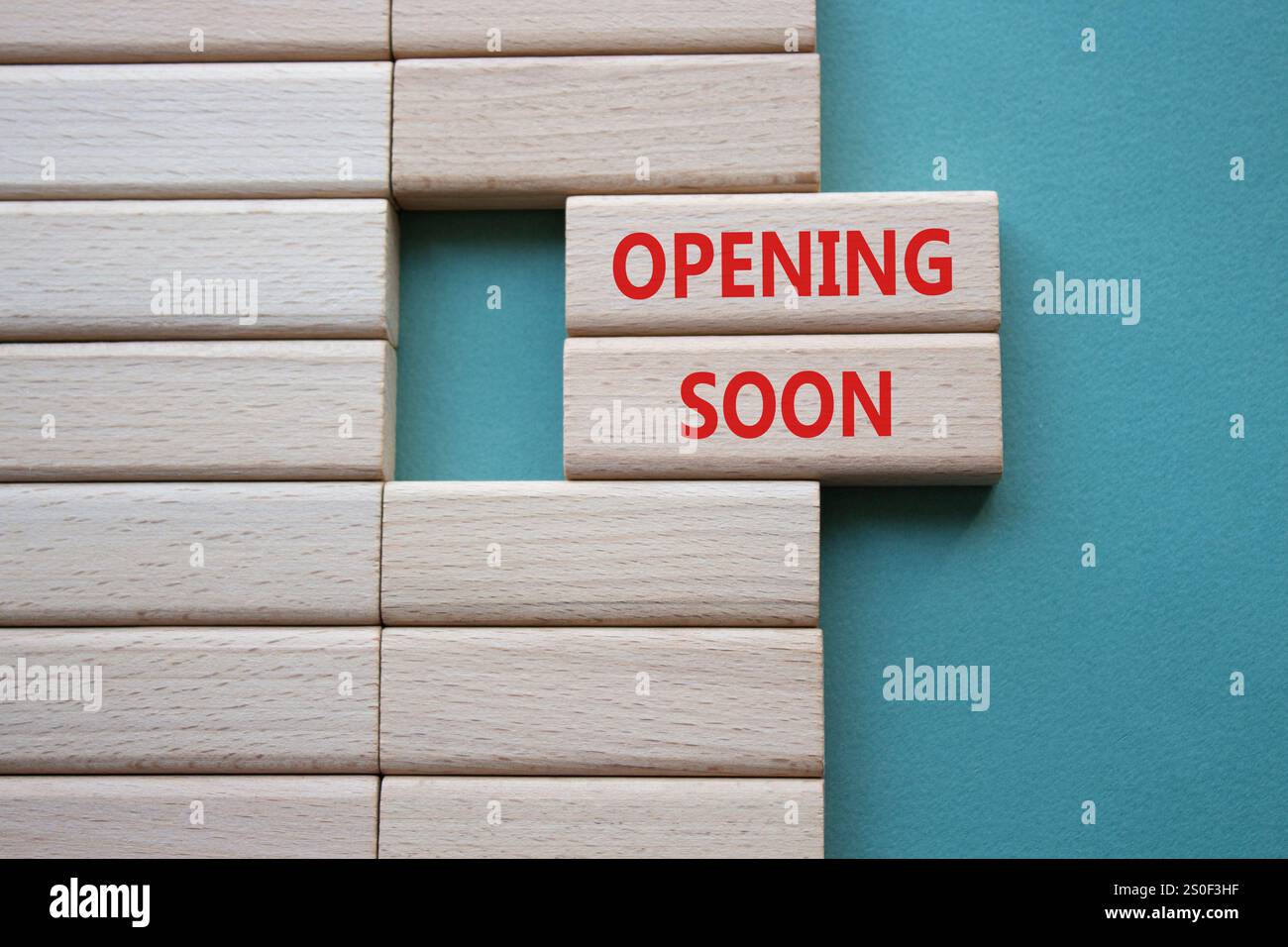 Opening soon symbol. Concept word Opening soon on wooden blocks ...
