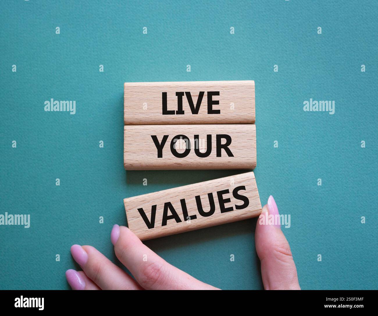 Live your values symbol. Concept words Live your values on wooden ...
