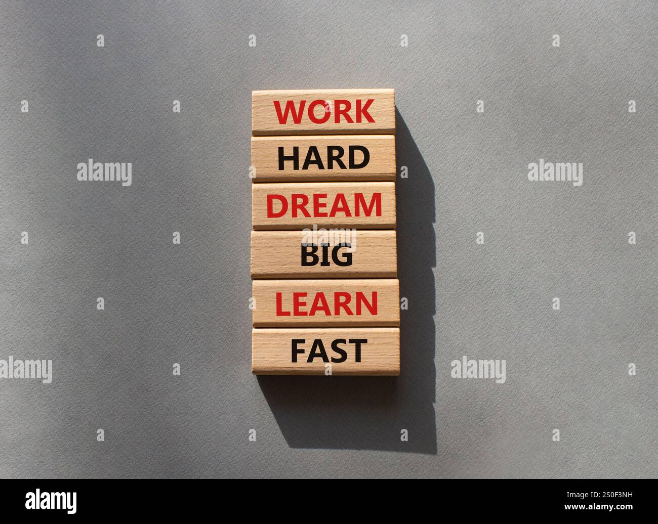 Work hard Dream big Learn fast symbol. Wooden blocks with words Work ...
